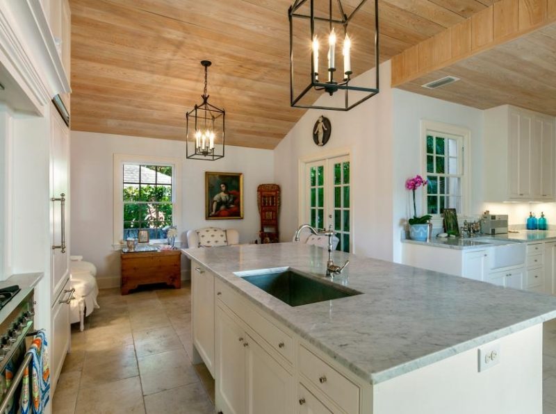 Traditional Kitchen With Wood Ceiling and White Walls